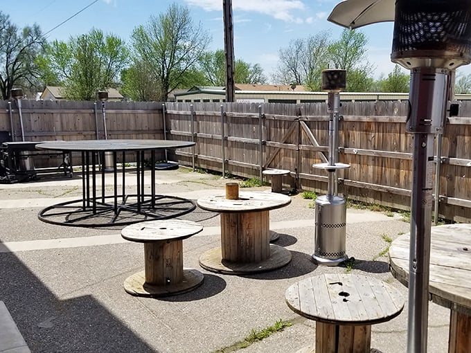 The outdoor patio features cable spool tables—ingenious upcycling that feels perfectly at home in this rural Kansas gem.