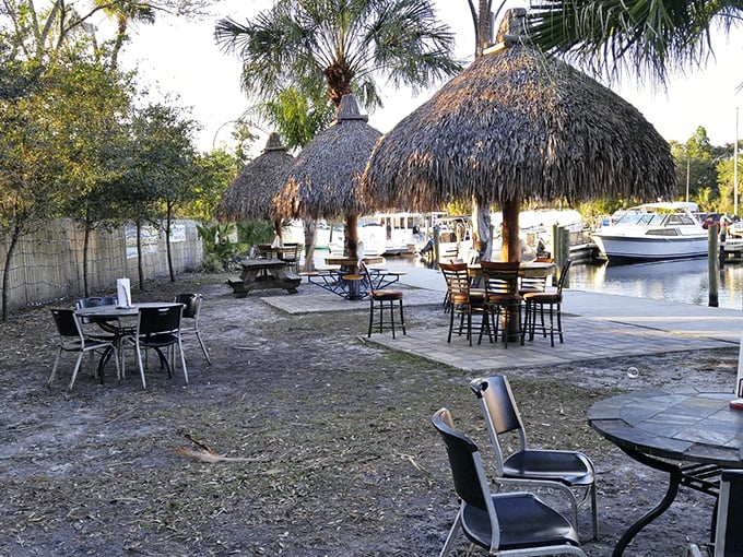 Tiki huts and waterfront views—Florida dining in its natural habitat. Simple tables, fresh air, and boats bobbing nearby create the perfect seafood backdrop.