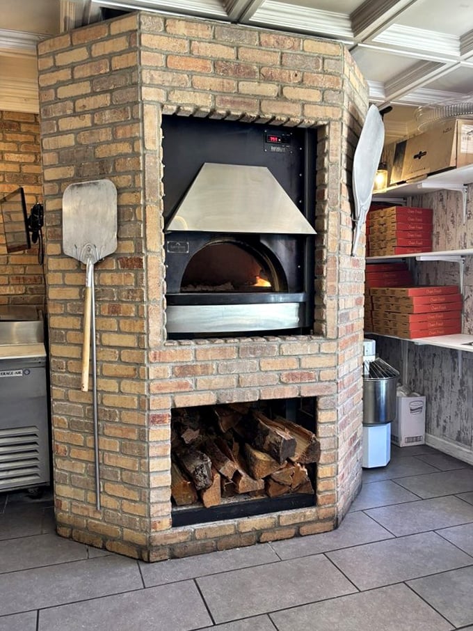 Not just any oven—a brick fortress dedicated to the art of perfect bread. The wood below suggests they take their baking very seriously.