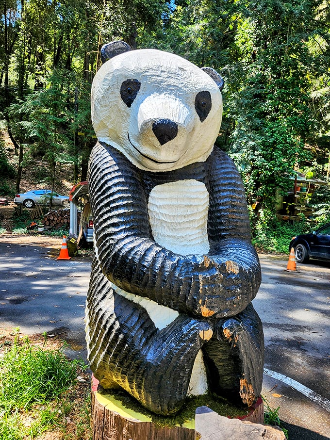This charming wooden panda sculpture greets visitors with a friendly face – handcrafted whimsy that's become increasingly rare in our digital world.