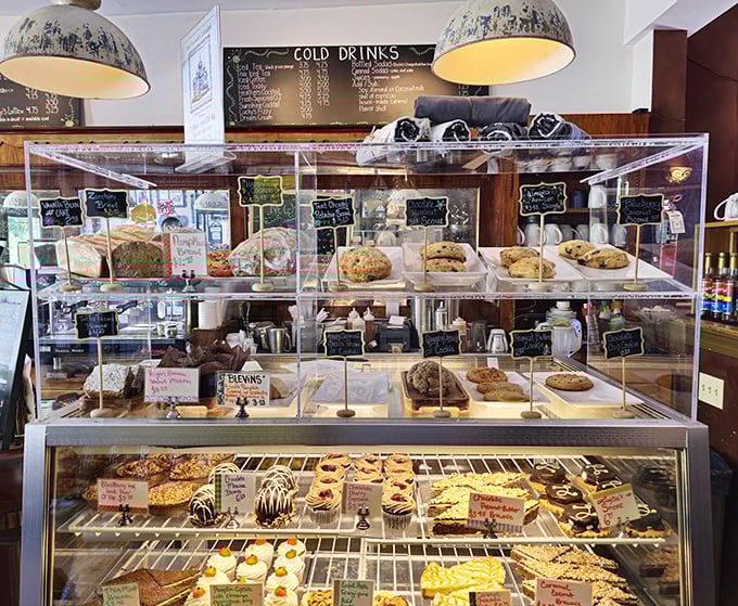 The pastry case—or as I call it, "The Museum of Delicious Decisions"—where every choice is somehow both right and wrong. 