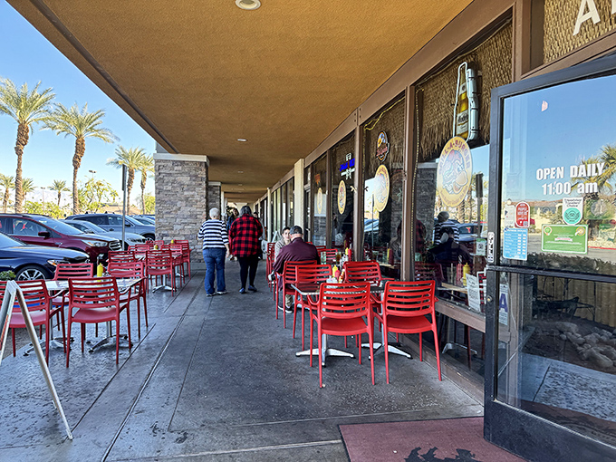 Desert dining with a side of people-watching. Those red chairs have witnessed countless first bites and expressions of burger euphoria.