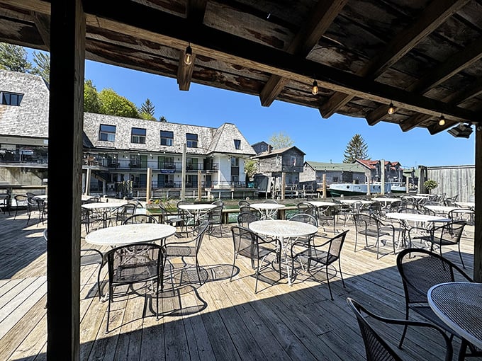 The deck where summer memories are made. These tables have witnessed more proposals, celebrations, and sunsets than anyone could count.