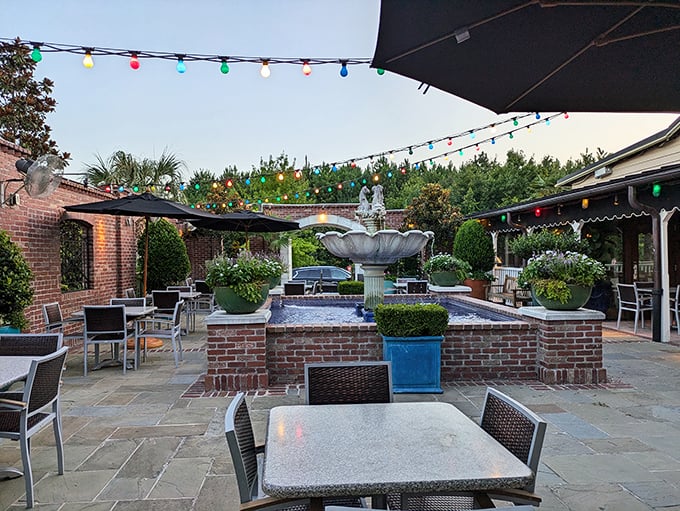 The patio offers al fresco dining with twinkling lights and a fountain—because seafood tastes even better with a gentle breeze.