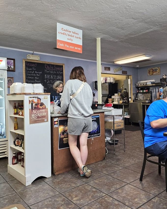The pay counter – that bittersweet final stop where you settle your modest bill and already start planning your return visit.