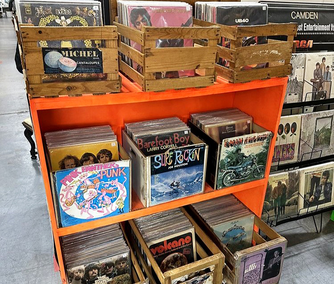 Vinyl treasures organized in wooden crates—each album cover art a time capsule of the era that produced it.