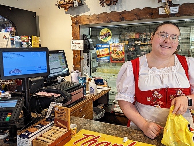Behind every great cheese shop is a friendly face ready to ring up your dairy treasures. Resistance to "just one more block" is futile.