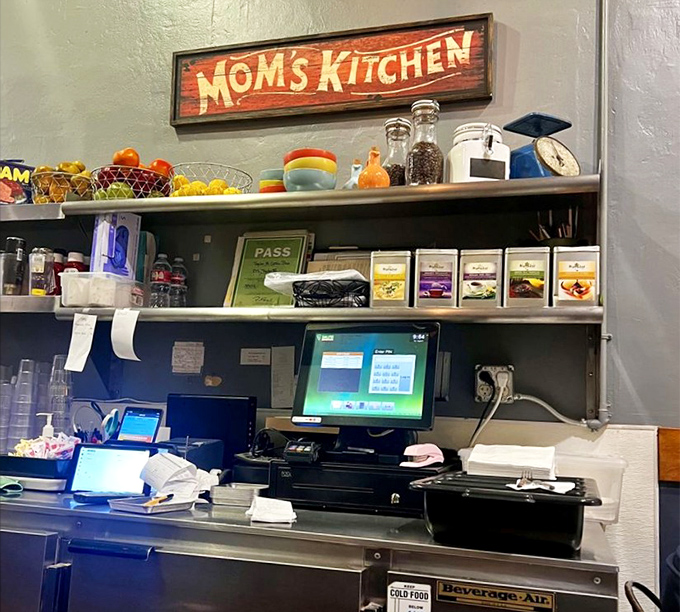 The "Mom's Kitchen" sign says it all—this isn't just a restaurant; it's a continuation of traditions that began in home kitchens generations ago.