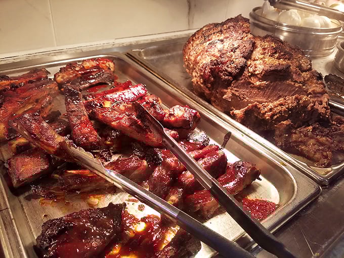Barbecued ribs glistening with sauce that would make Kansas City jealous—because great buffets know life isn't just about seafood.