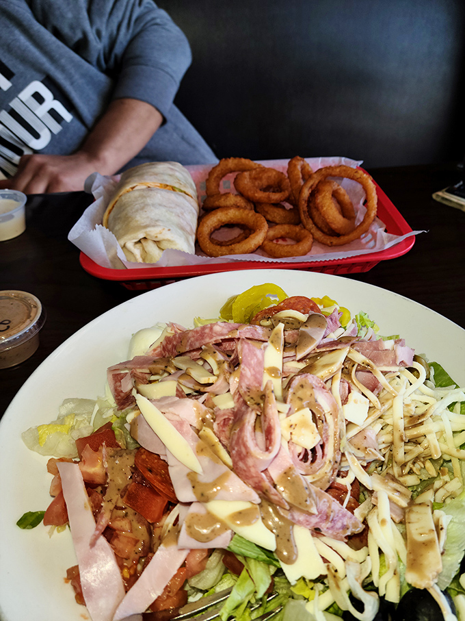 This isn't just a salad—it's a declaration that taverns understand balance. All those cold cuts and cheese make it the kind of salad that doesn't feel like punishment.