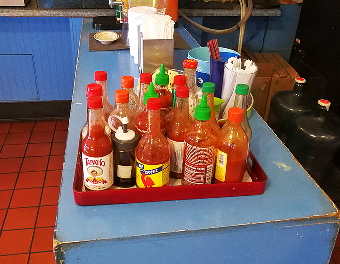 The sauce station – that magical place where hot sauce aficionados can customize their seafood experience with varying degrees of delicious heat.