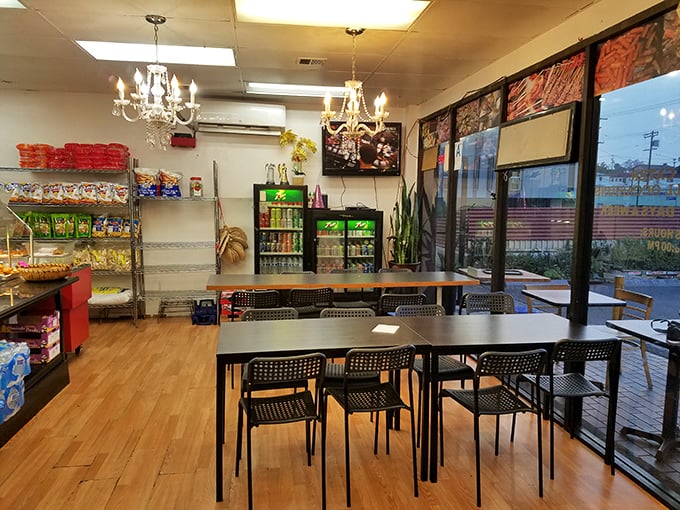 The indoor seating area feels like your Filipino friend's living room – if that friend happened to have chandeliers and serve incredible street food.