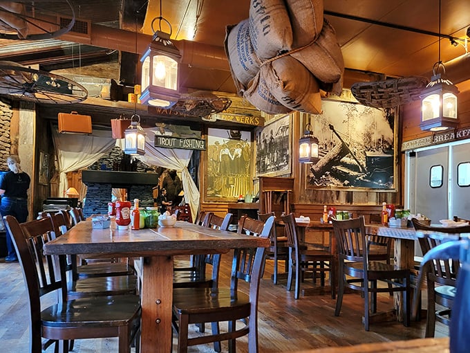 Burlap sacks overhead and lanterns casting warm light—dining here feels like you've wandered into a Hollywood set designer's vision of frontier life.
