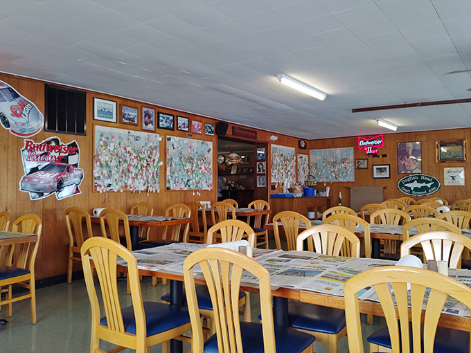 Simple wooden chairs, paper-covered tables, and walls filled with memories—Sambo's knows ambiance comes from authenticity, not interior designers.