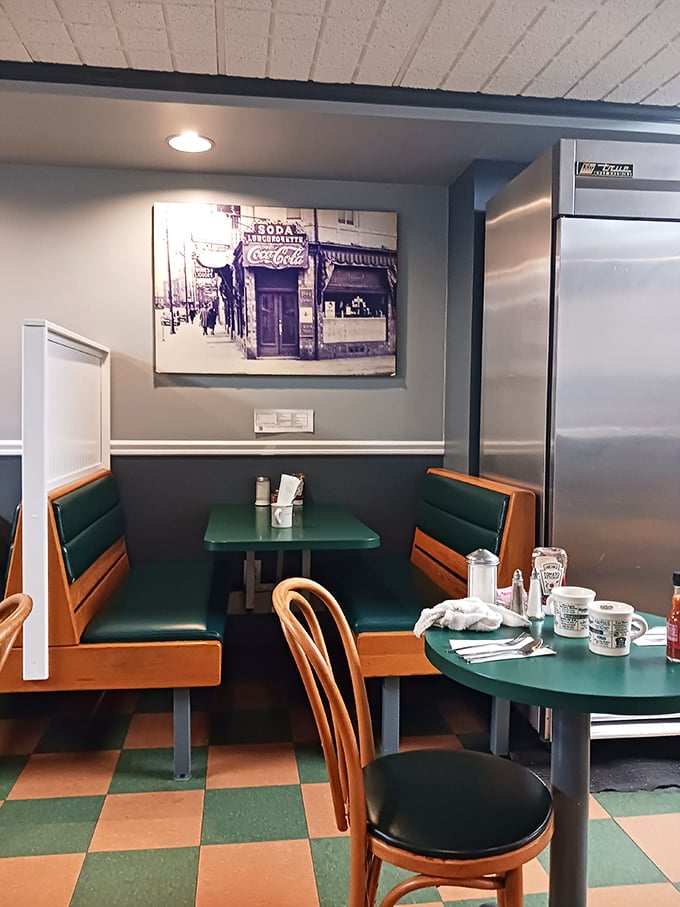 Corner booths with vintage photos on the wall – the perfect spot to solve the world's problems over coffee.
