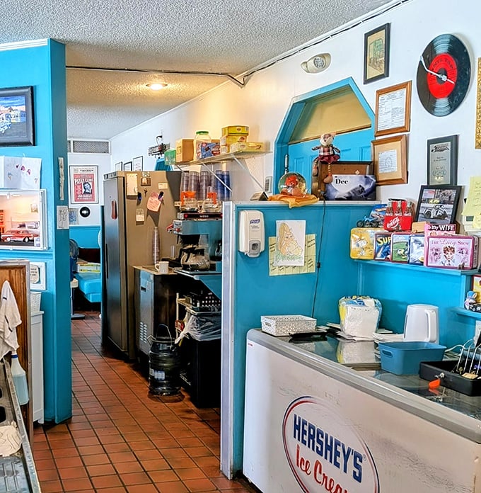 The service counter isn't just where orders happen—it's mission control for comfort food operations, complete with nostalgic decorations that tell stories without saying a word.