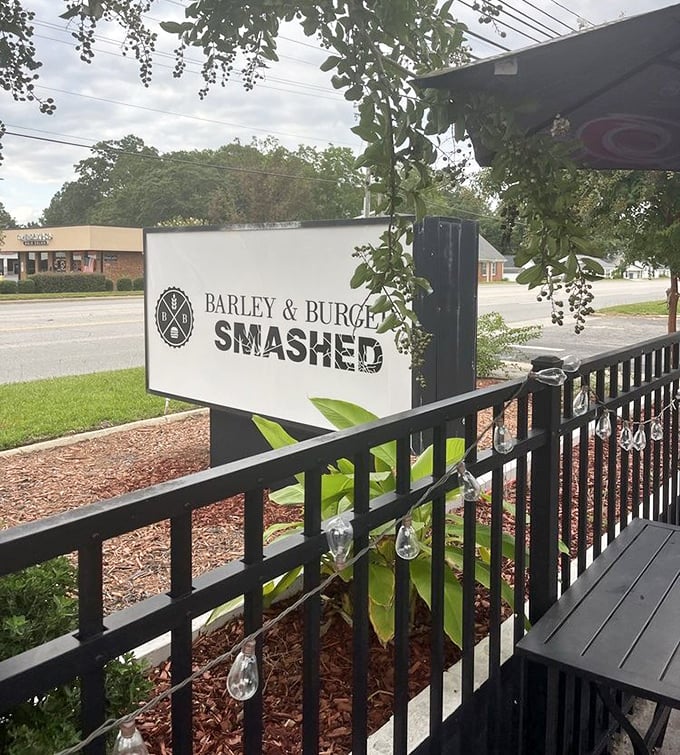 The sign promises what the kitchen delivers: a smashing good time for your taste buds. No false advertising here.