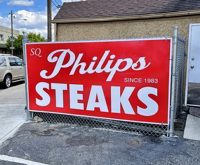 The sign says it all: STEAKS, PORK, HOAGIES. No need for fancy adjectives when your reputation speaks for itself.