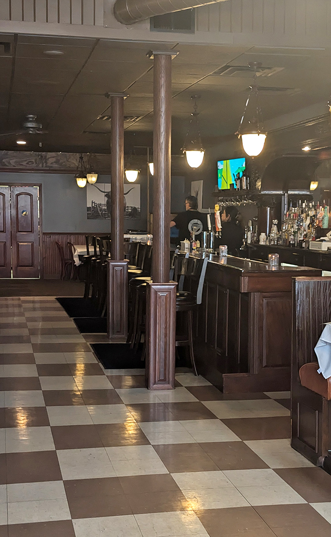 The bar area invites you to pull up a seat and share stories while the bartender crafts your evening's liquid companion.