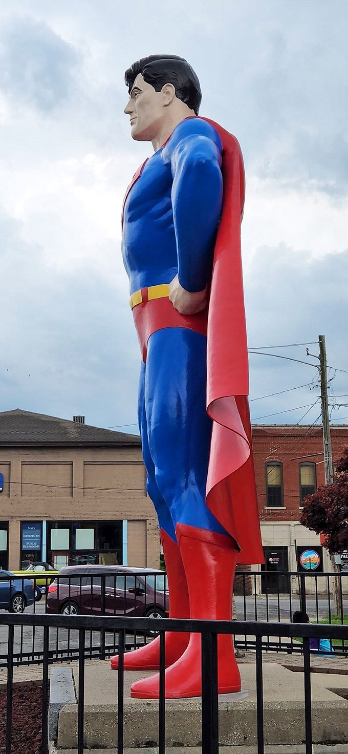 The side view reveals Superman's impressive profile—and that perfectly coiffed hair that somehow never gets messed up during flight.