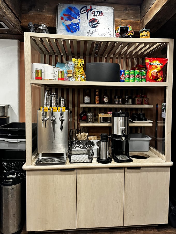 Behind every great restaurant is an organized beverage station. The tiger figurine stands guard over coffee essentials like a caffeinated sentinel.