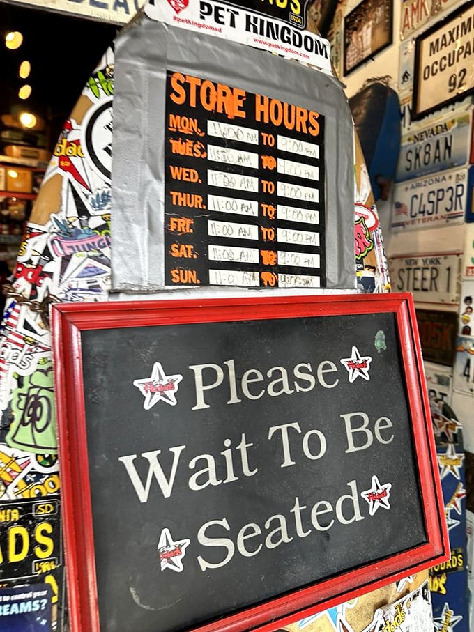 "Please Wait To Be Seated" – four words that simultaneously test your patience and promise imminent burger satisfaction.