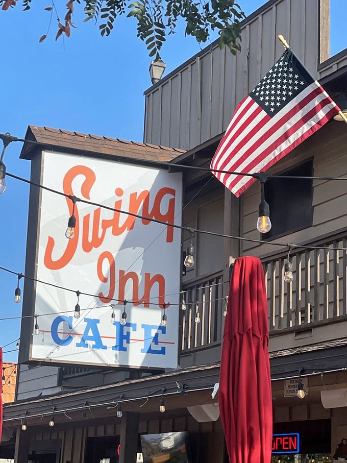That classic Swing Inn sign beckons like an old friend waving you over for dinner.