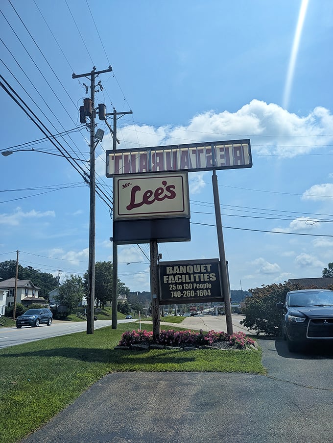 That roadside sign has been directing hungry travelers to salvation for decades. In the GPS era, it's refreshingly analog—and infinitely more charming.
