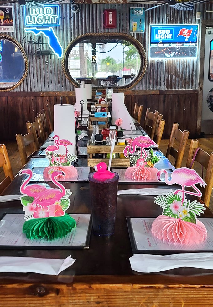 Table decorations that don't take themselves too seriously. Honeycomb flamingos and Florida-shaped neon create the perfect "you're on vacation" vibe.