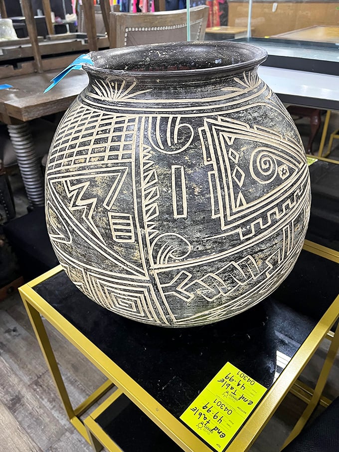 Ancient geometry meets modern decor! This tribal-carved pot isn't just a vessel—it's functional artwork with stories etched into every line.