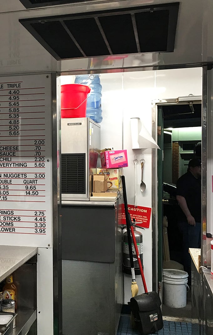 The behind-the-scenes utility area—where cleanliness and order maintain the rhythm of a well-oiled American diner.