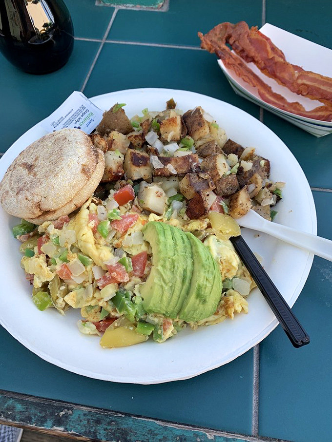 The veggie scramble that proves vegetables can party too—a colorful fiesta of eggs, avocado, and potatoes that even carnivores secretly covet.
