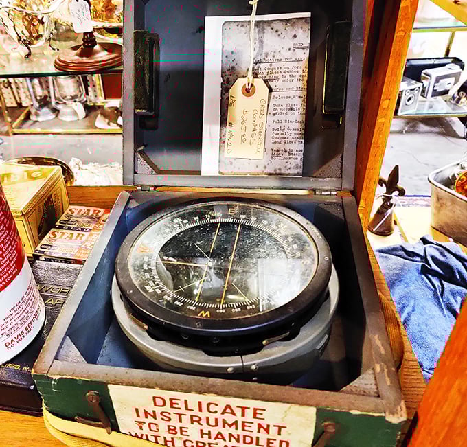 Delicate Instrument—both the warning and the beauty of this vintage compass speak to an age when navigation required skill, not satellites.