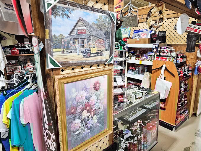 Vintage Coca-Cola signs and floral paintings create a slice of Americana. This booth perfectly captures that nostalgic small-town general store feeling that's increasingly hard to find.
