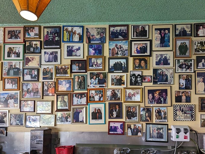The wall of fame where everyone's a celebrity – because breaking bread together is the ultimate equalizer in Oakland.