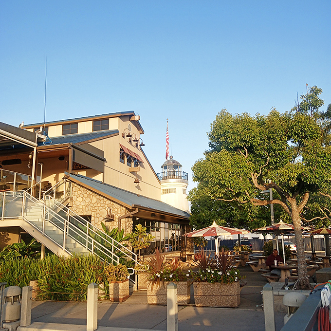 With its lighthouse backdrop and harbor-side patio, this spot pairs nautical charm with classic Southern California seafood.
