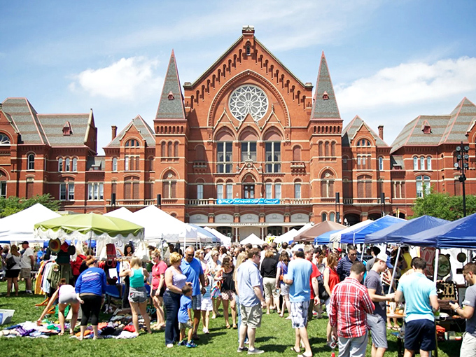 White tents pop against Cincinnati's architectural backdrop, creating a marketplace that feels both cosmopolitan and comfortably local.