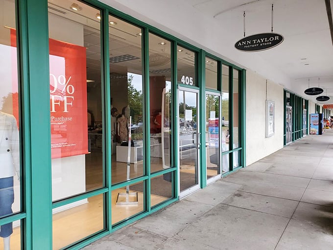 Ann Taylor's 50% off sign – the mathematical equation that justifies buying twice as much while spending the same amount.