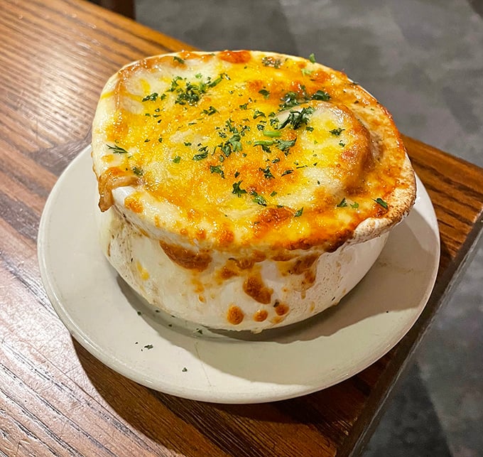 French onion soup that's had a passionate affair with cheese – their bubbling romance sealed under a golden broiled crust.