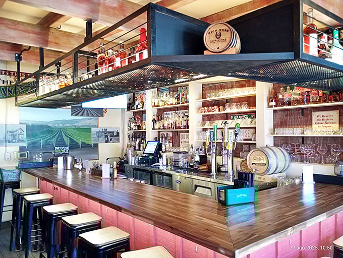A bar that understands breakfast mimosas and evening whiskeys deserve equal respect. Those bar stools have supported the weight of countless celebrations and consolations.