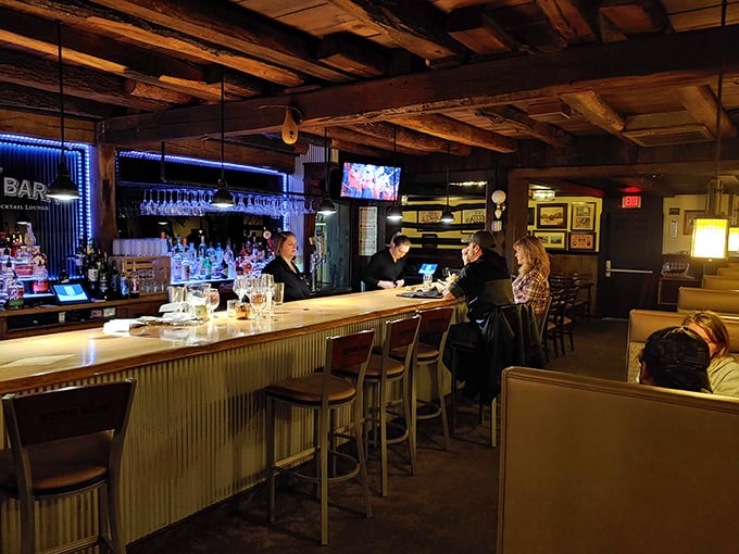 The bar isn't just serving drinks—it's creating liquid companions for your meal in an atmosphere that makes strangers feel like neighbors.