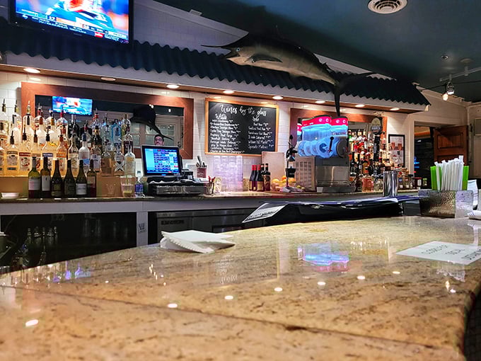 The bar area beckons with promise of perfectly paired beverages and perhaps a raw bar appetizer.