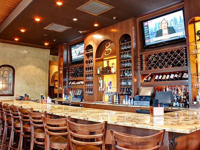 The marble-topped bar with its impressive backdrop of spirits and wines invites you to pull up a chair and stay awhile.