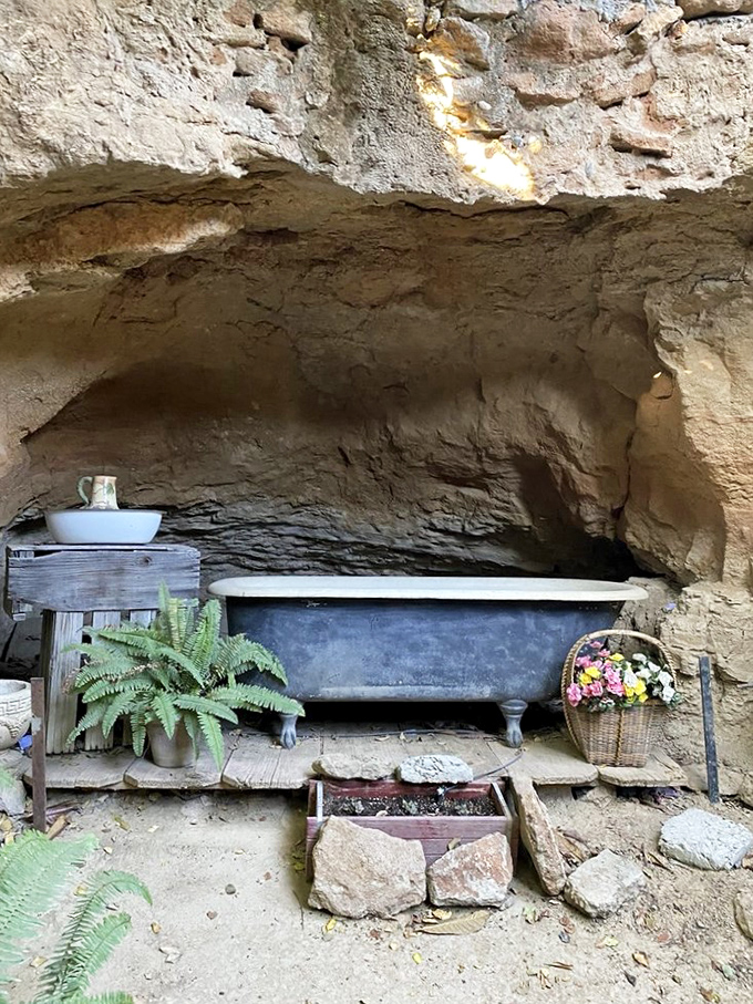 Even bathing went underground—this vintage tub nestled in its earthy alcove proves luxury can exist anywhere with enough imagination.