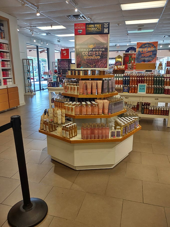 Bath & Body Works' fragrant display island – where you'll enter planning to buy one hand soap and leave with seventeen seasonal scents you didn't know you needed.