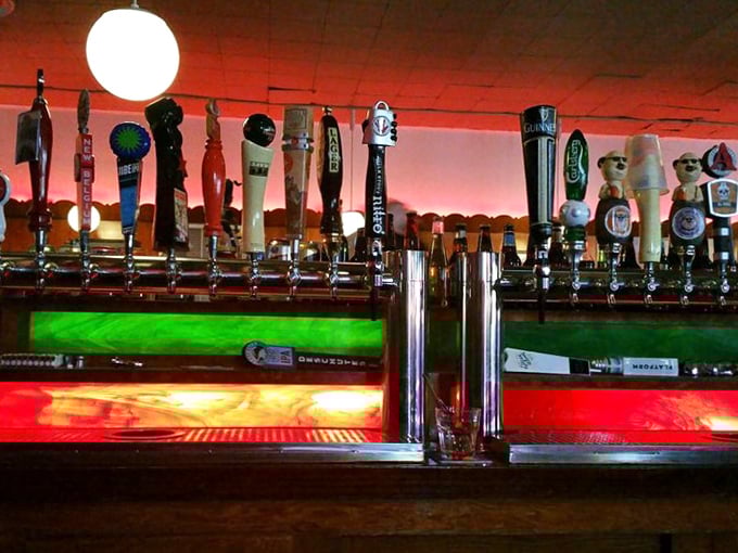 The tap lineup reads like a love letter to craft beer enthusiasts – each handle promising the perfect companion to your elaborately topped dog.