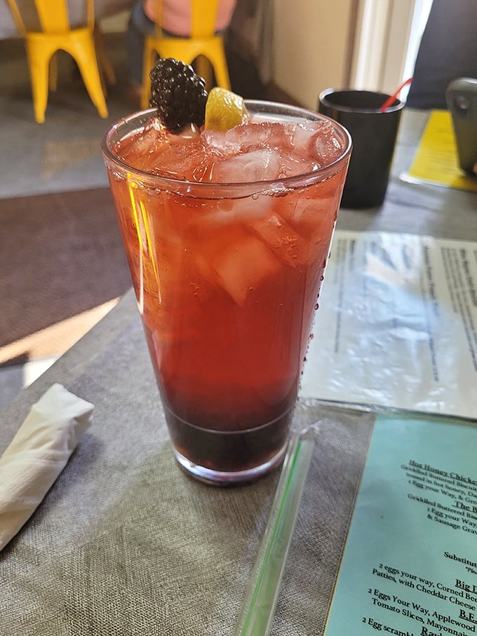 A berry-garnished beverage that's not just refreshing—it's what summer would look like if you could pour it into a glass.