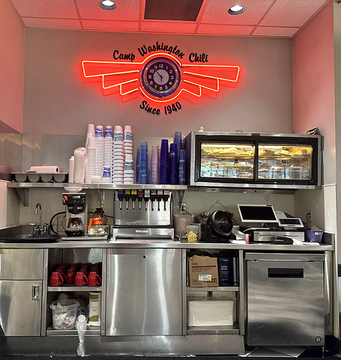 Behind the scenes magic happens here. That neon sign isn't just decoration – it's a promise of 24-hour deliciousness.
