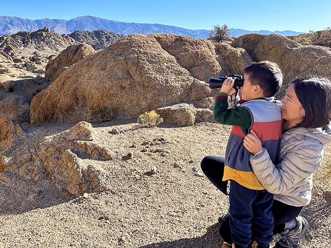 Future naturalists at work—where binoculars transform curious kids into passionate explorers of this magnificent wilderness.