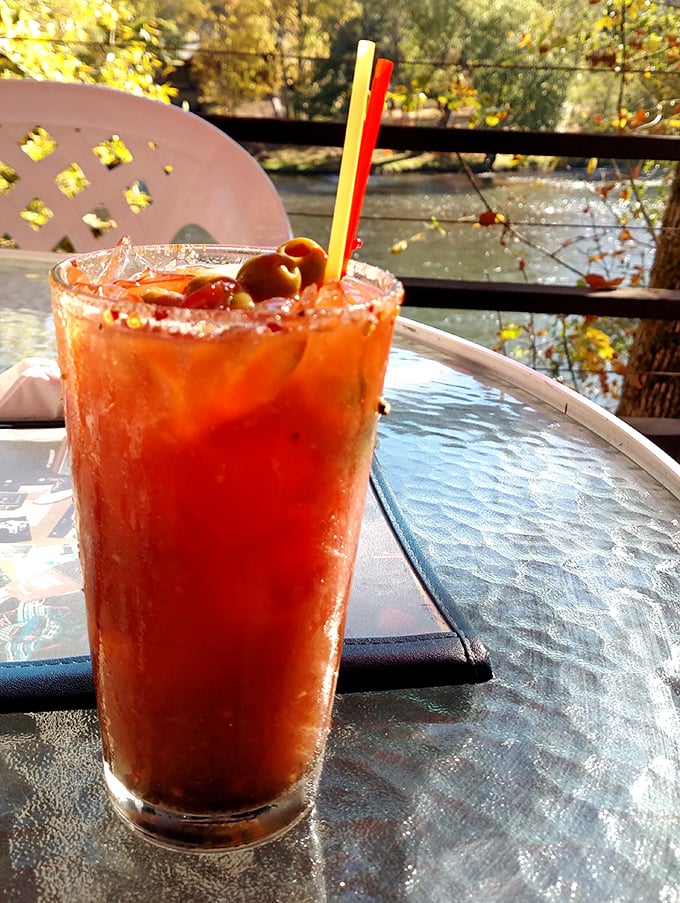 The Bloody Mary with a view—spicy, savory, and garnished with enough vegetables to count as a side salad. The Rogue River backdrop is complimentary.